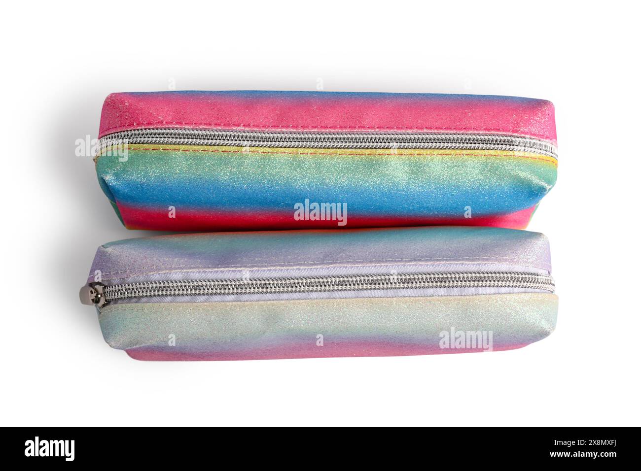 Colorful pencil cases on white background Stock Photo - Alamy