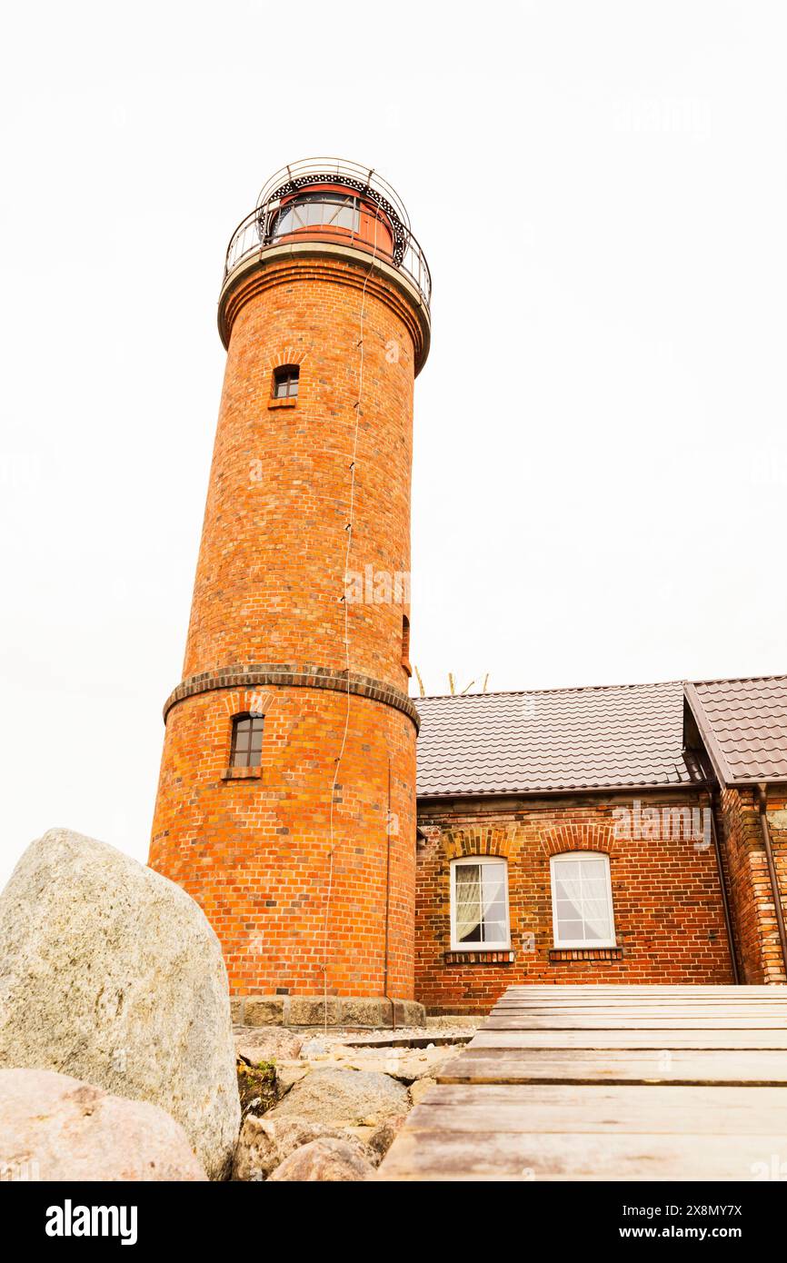 A brick building with a lighthouse standing majestically atop, catching ...