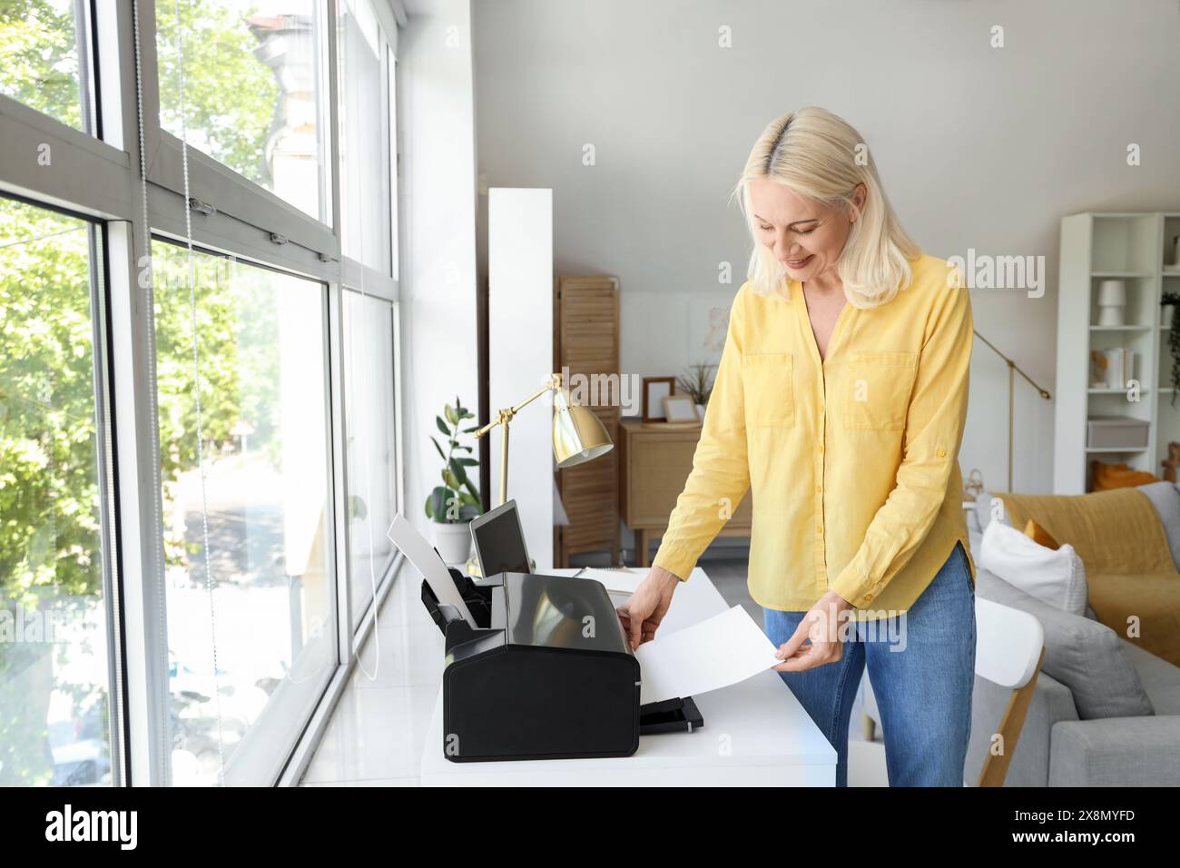 Mature printer hi-res stock photography and images - Alamy