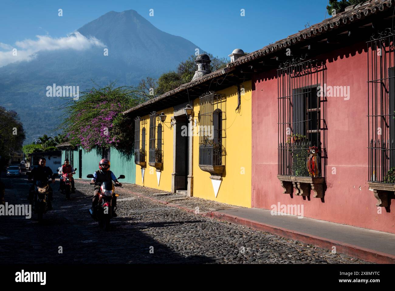 Colourful cobblestone street in the Spanish colonial-era city centre ...
