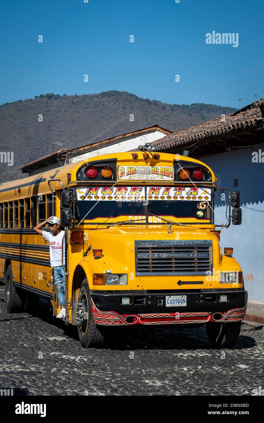 Colourful chicken bus in the Spanish colonial-era city centre, Antigua ...