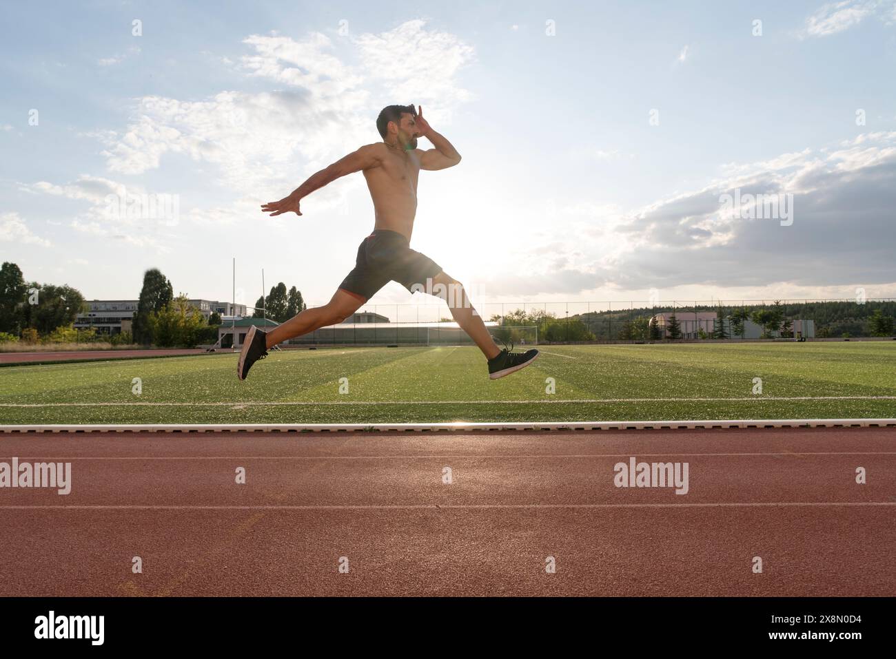 An athlete who long jumps and jumps high Stock Photo - Alamy