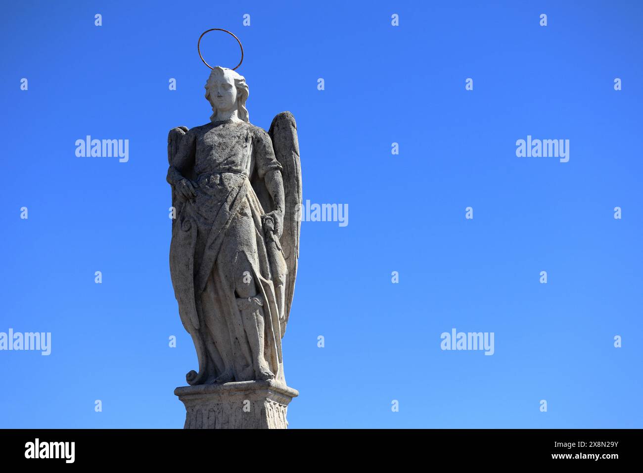 Marble column with Archangel statue on the top. Triumph of San Rafael ...