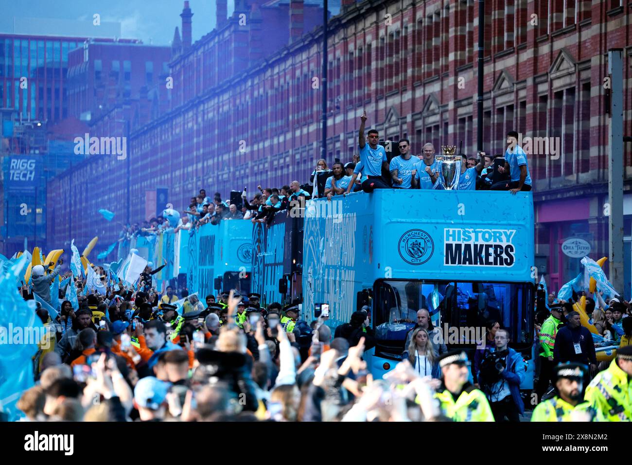 A general view of the Manchester City team bus during a trophy parade ...