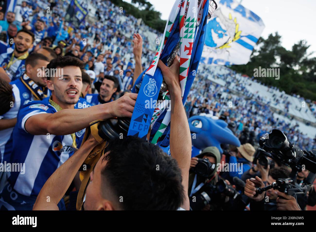 Team of FC Porto celebrates with a trophy during Taca de Portugal 2024 ...