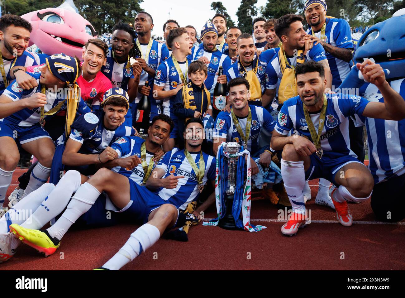 Team of FC Porto celebrates with a trophy during Taca de Portugal 2024 ...
