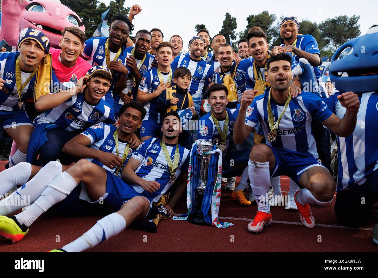 Team of FC Porto celebrates with a trophy during Taca de Portugal 2024 ...