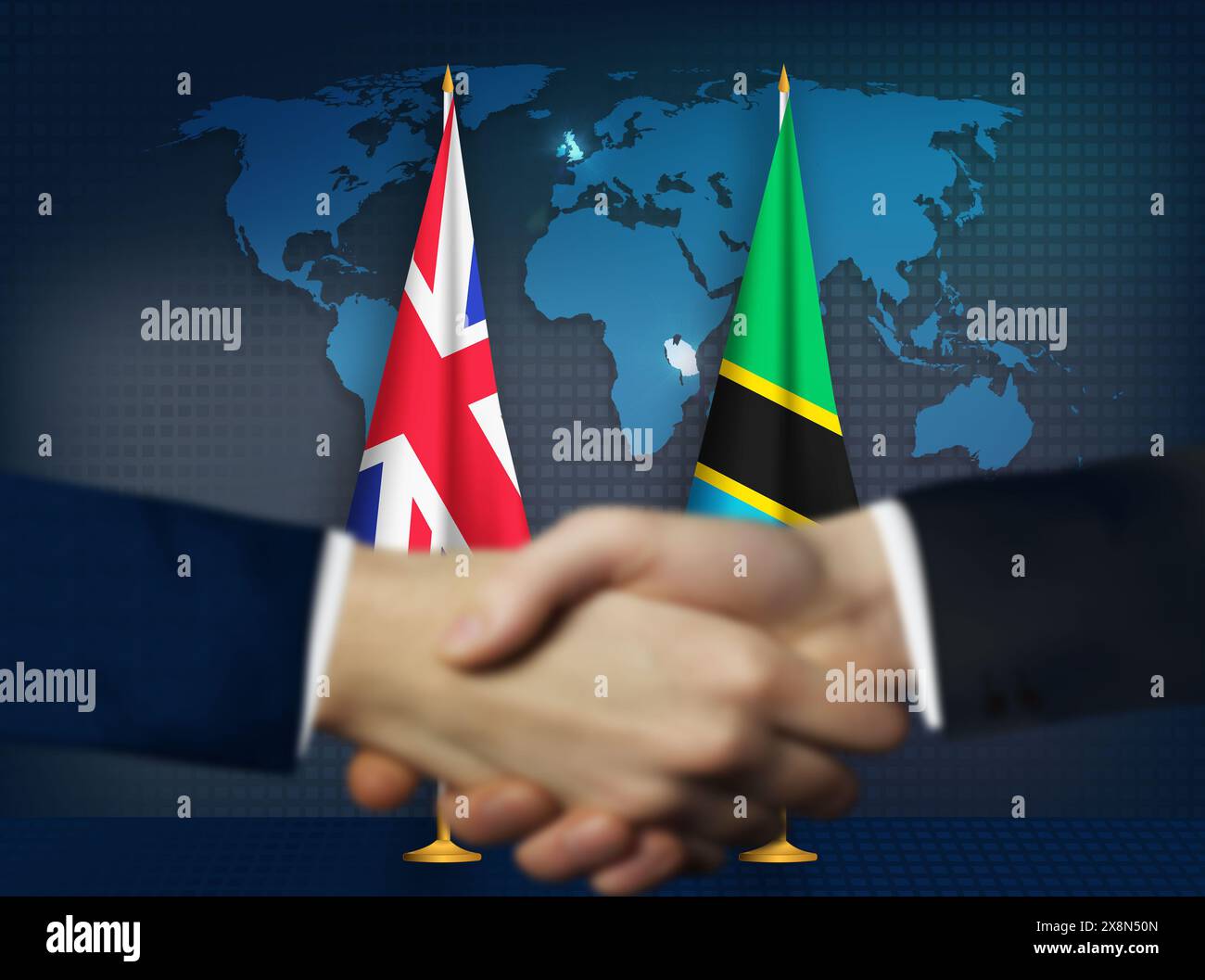 Two people shaking hands in front of Tanzania and UK flags Stock Photo ...