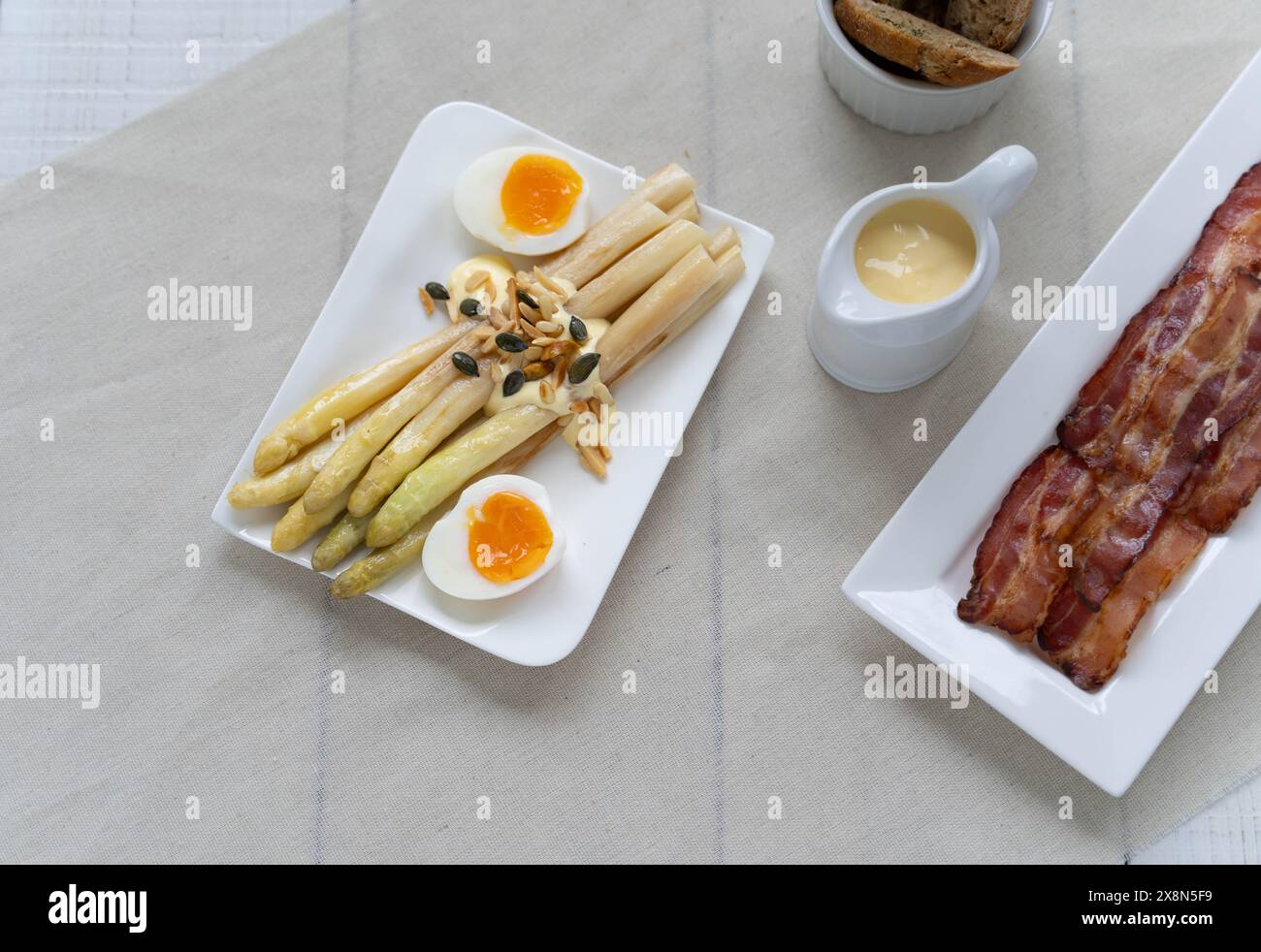 White asparagus served with boiled eggs. Asparagus is very popular in ...