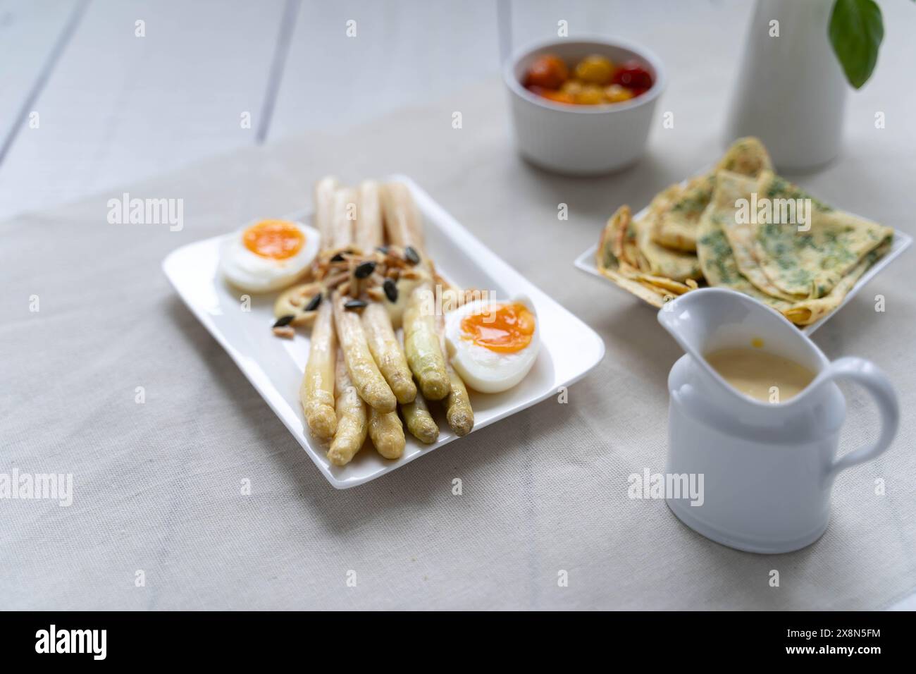 White asparagus served with boiled eggs. Asparagus is very popular in ...