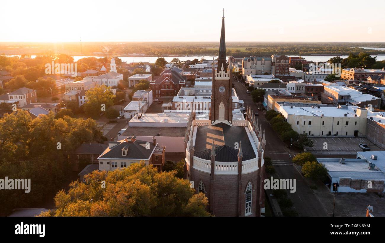 Natchez, Mississippi, USA - April 21, 2024: Sunset light shines on a ...