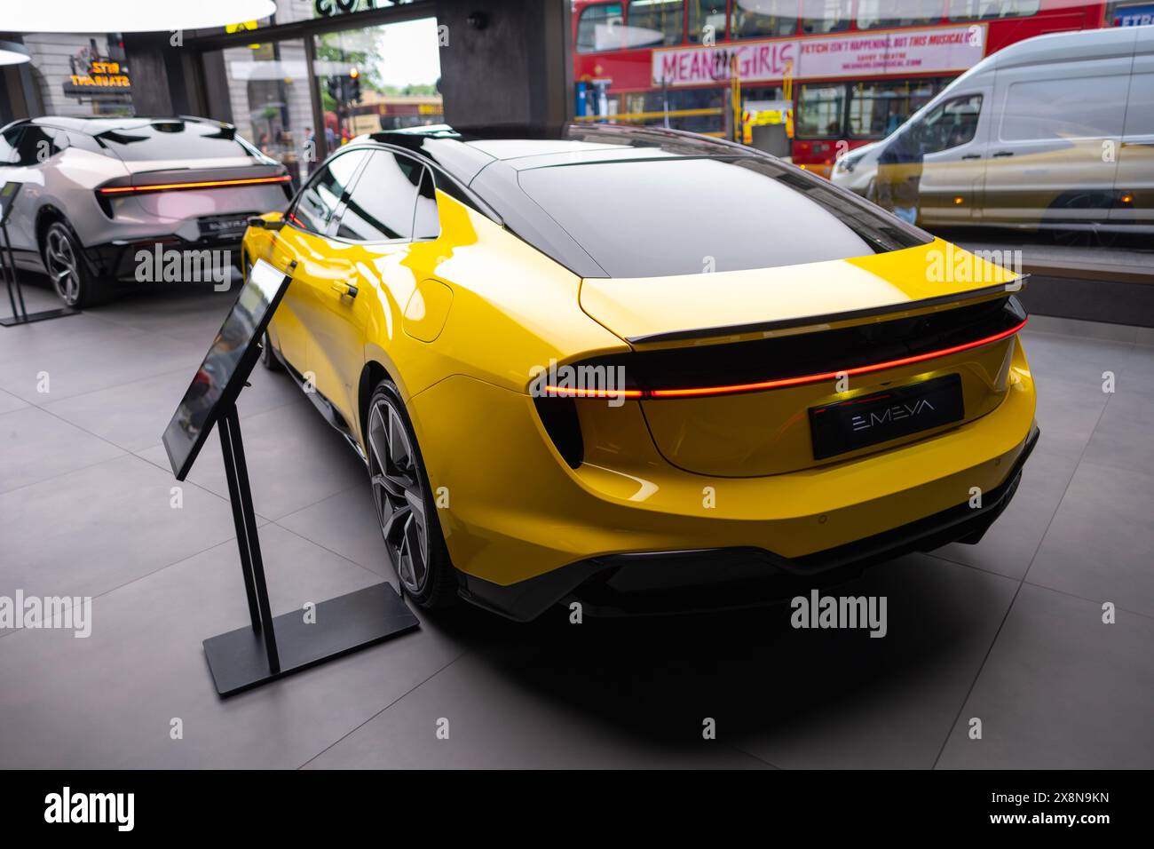 new yellow battery-Electric Hyper-GT Lotus Emeya in showroom, British ...