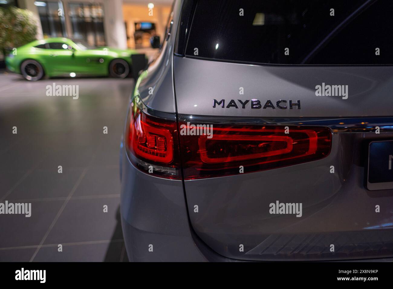 closeup badge logo silver Maybach GLS SUV rear view, car EV Mercedes ...