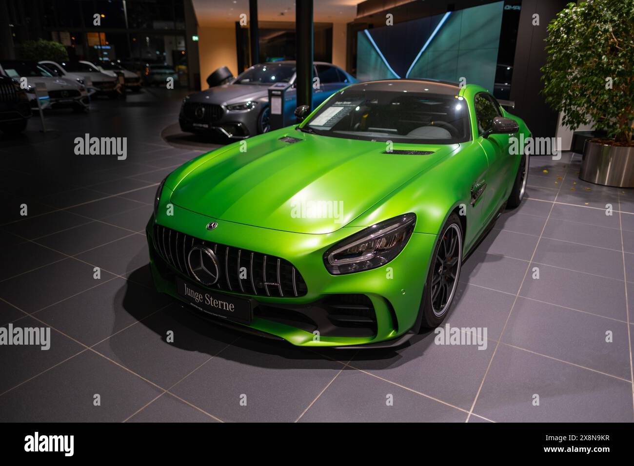 powerful green Mercedes-AMG GT 63 S E Performance racing car parked in ...