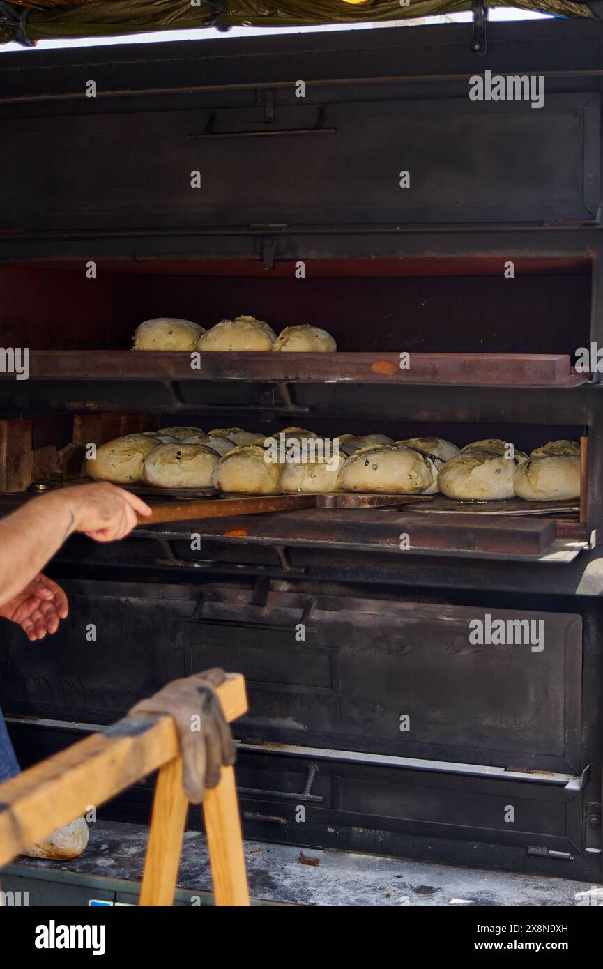 Baking process of artisanal bread with seeds in an industrial bakery ...