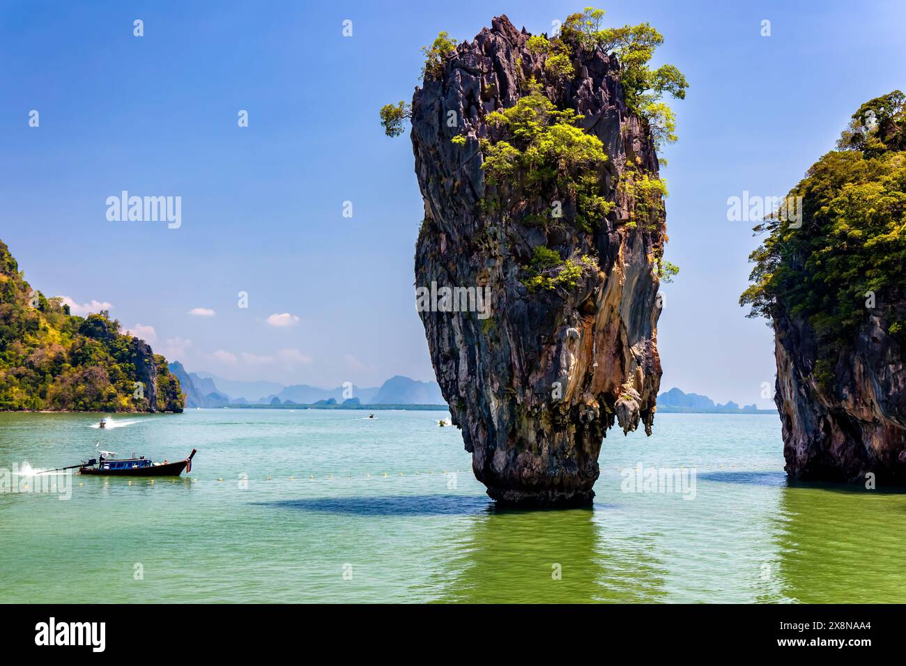 Limestone karst and pinnacle in a tropical ocean in Phang Nga, Thailand ...