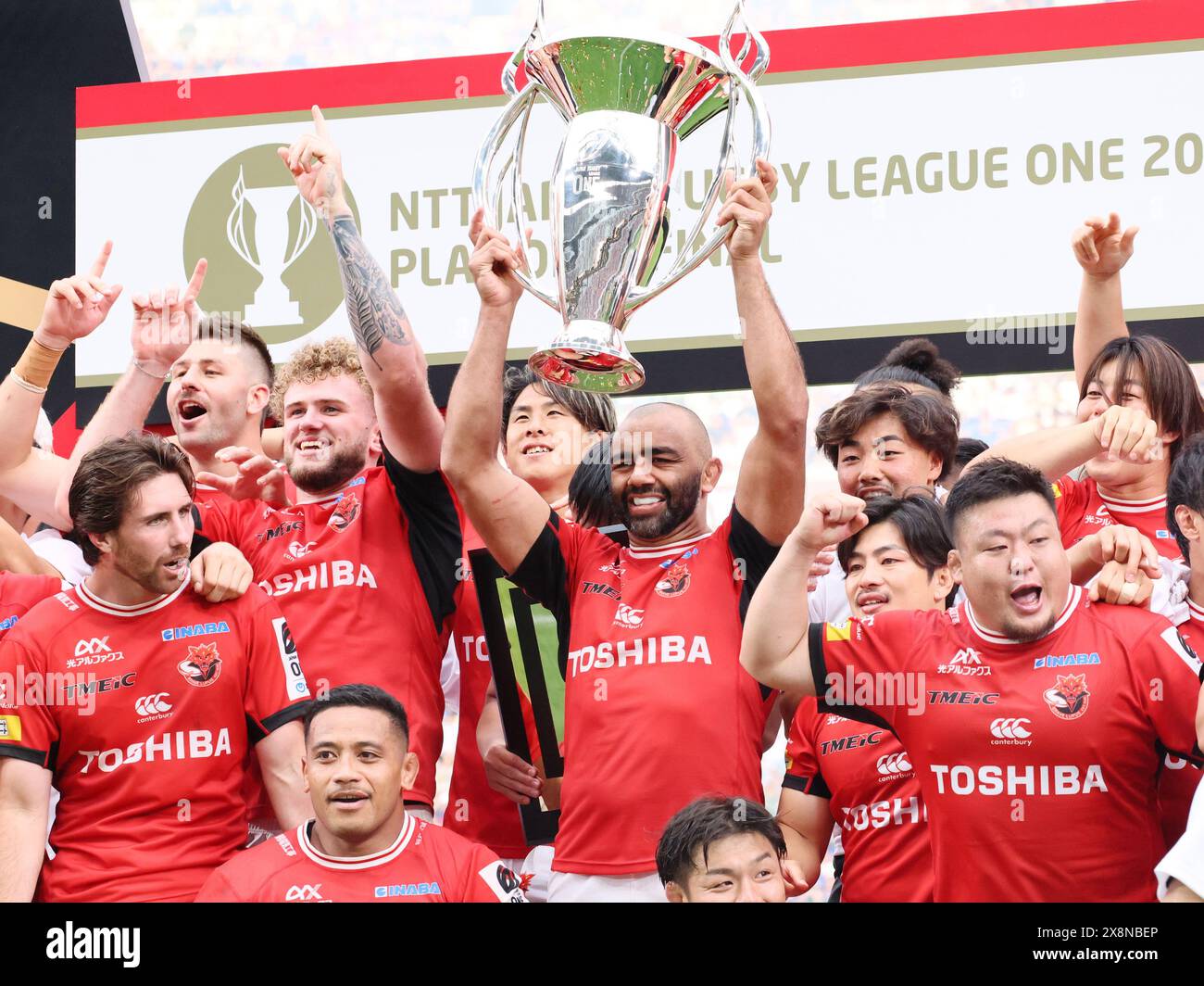 Tokyo, Japan. 26th May, 2024. Toshiba Brave Lupus Tokyo captain Michael Leitch raises the trophy ...