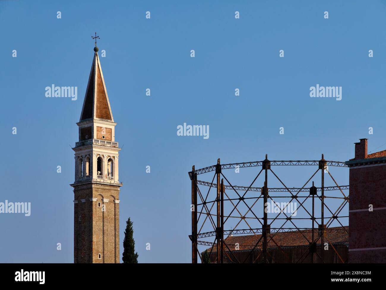 Italy, Venice, bell tower and an old gasometer structure Stock Photo ...