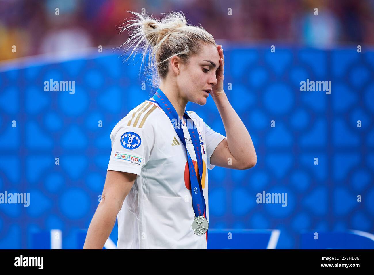 Ellie Carpenter of Olympique Lyonnais looks dejected as she walks past ...