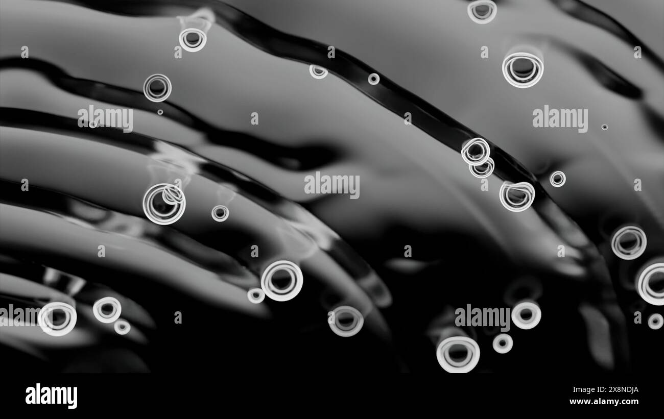 Top view of drops falling into water surface and diverging circles in ...