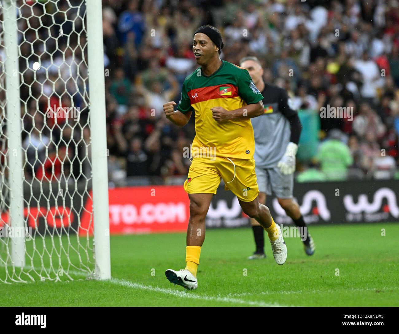 Soccer stars participate in a charity match for the victims of the ...