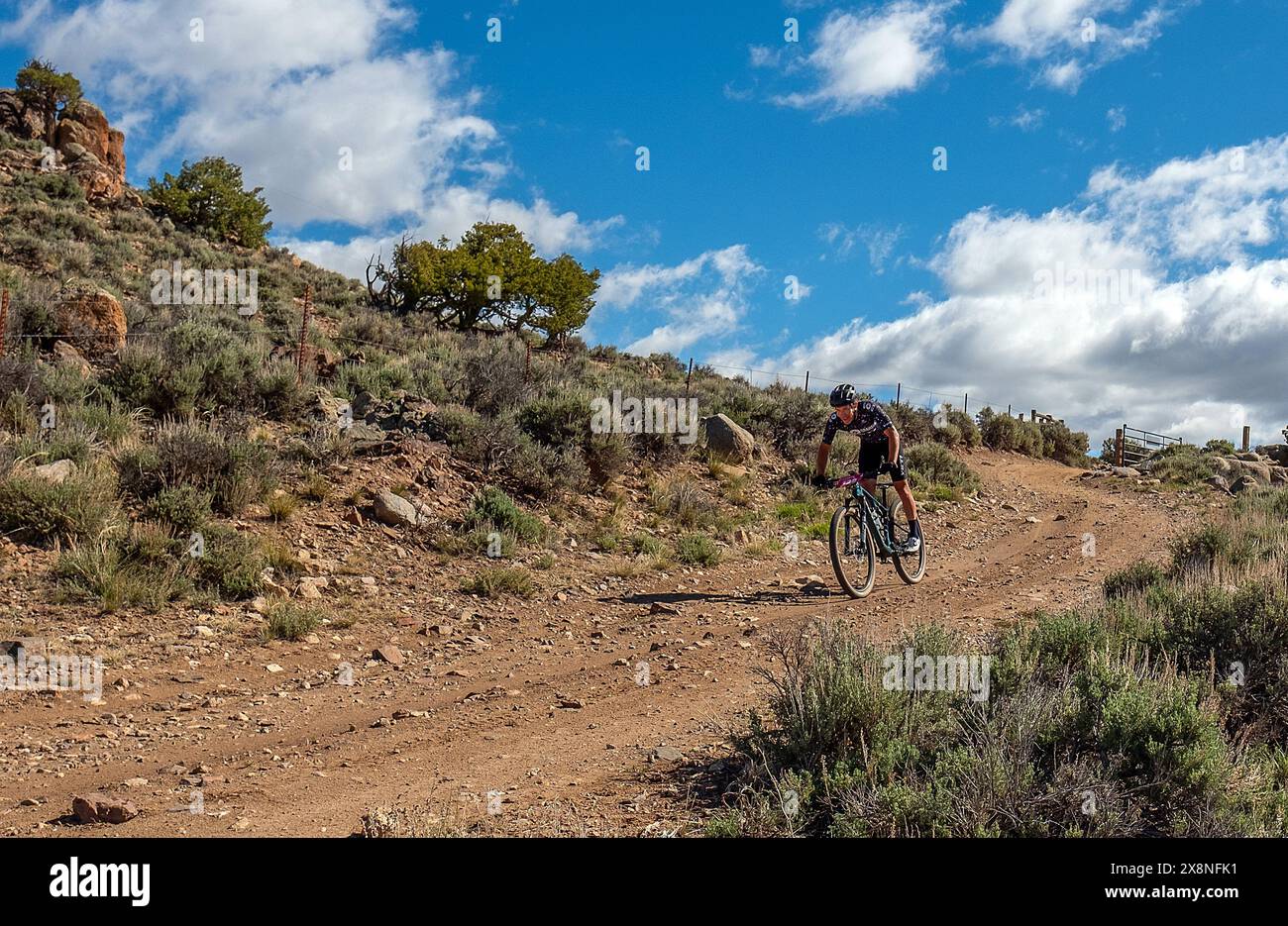 May 26, 2024: Cyclist, Nathaniel Vacura, powers toward Skull Pass ...