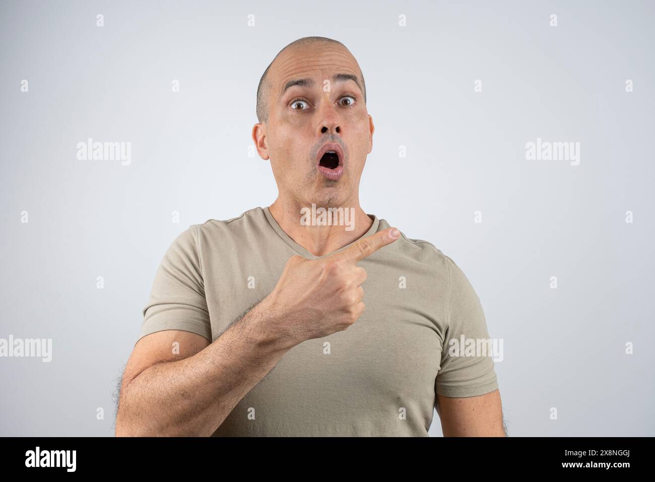 Caucasian, Brazilian man, 48 years old, in the studio showing emotions ...