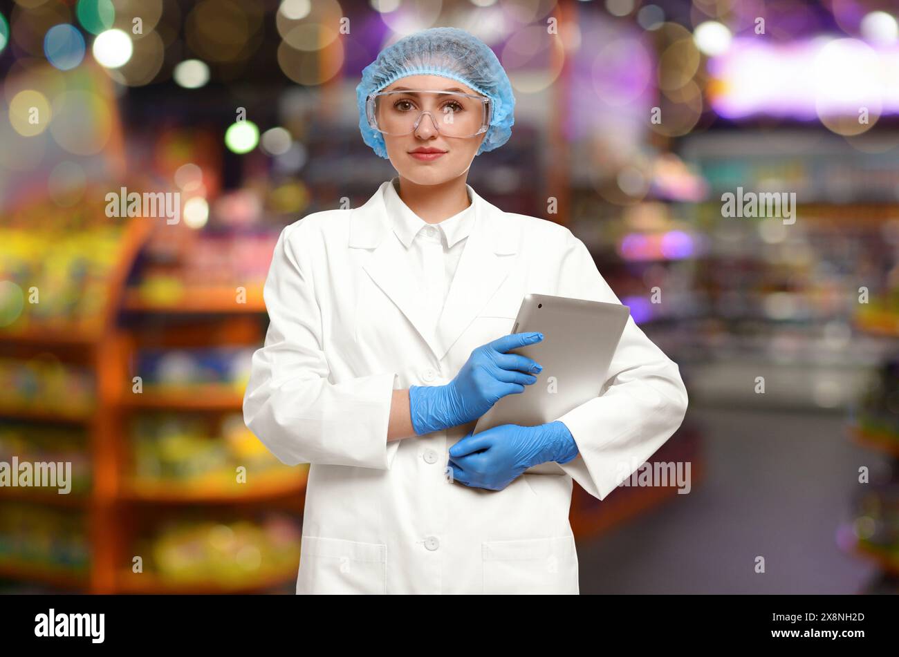 Beautiful female technologist in uniform hi-res stock photography and ...