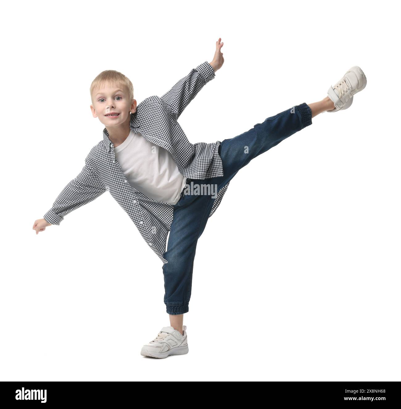 Happy little boy dancing on white background Stock Photo - Alamy