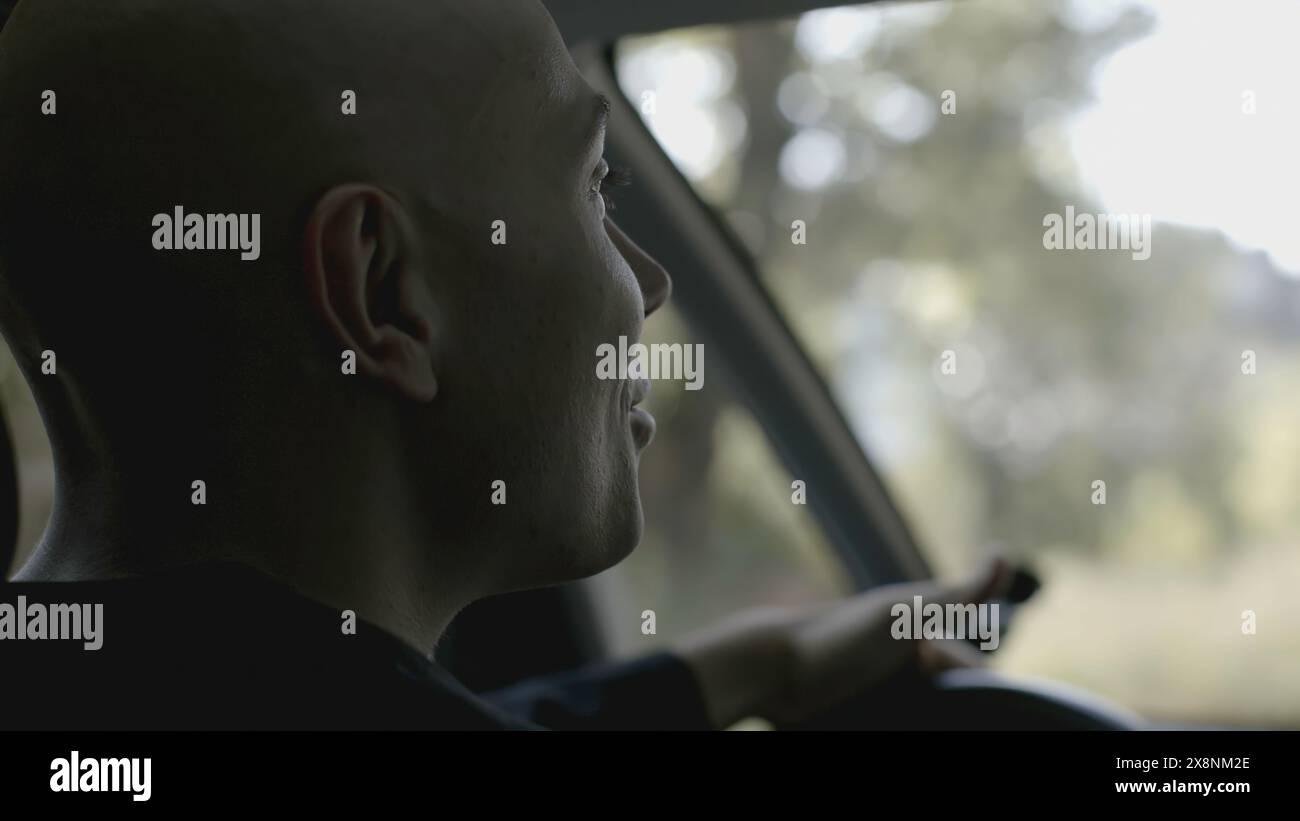 Rear view of talking taxi driver. Stock. View from passenger seat to ...