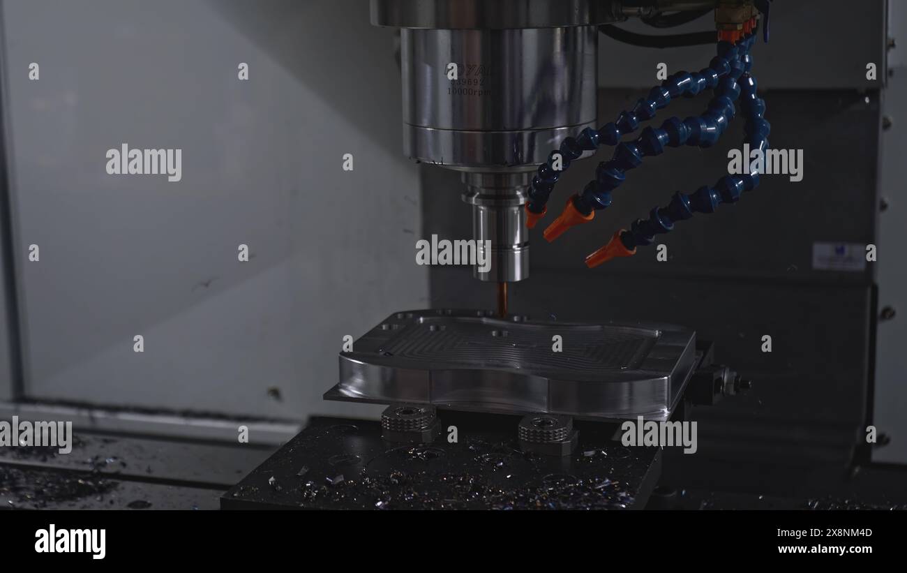 Automated rotating drill for metal. Media. Machine with drill moving in ...