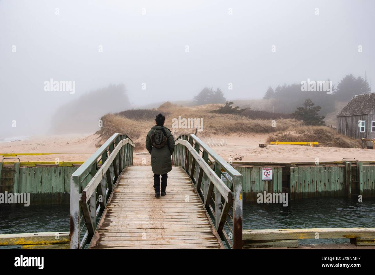 Wooden pedestrian bridge at Basin Head Provincial Park in Kingsboro ...