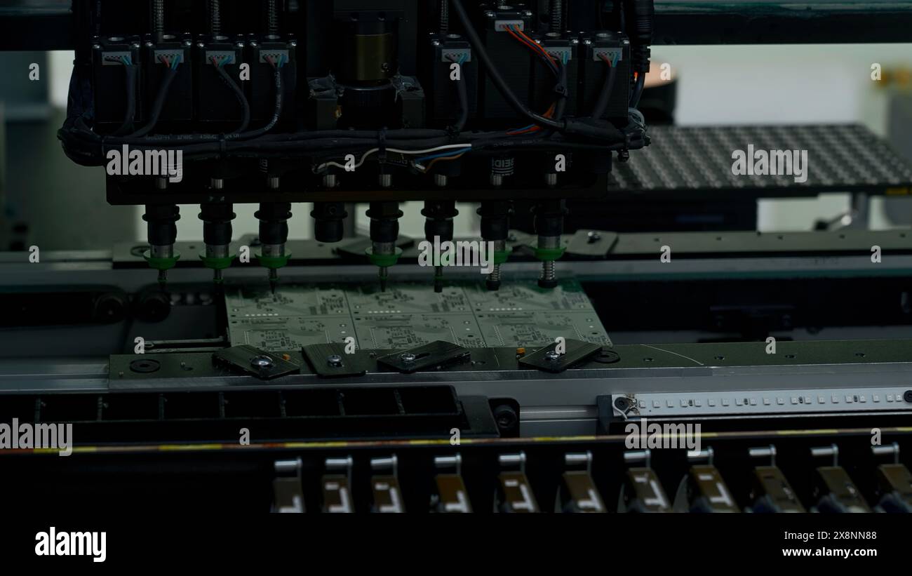 Smt machine installing components hi-res stock photography and images ...