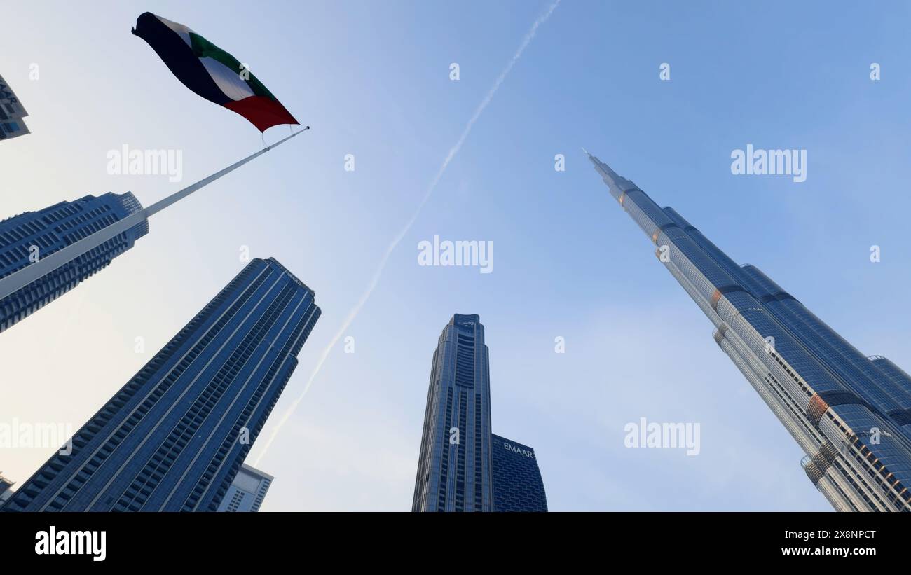 Burj Khalifa at Dubai Mall in UAE, famous landmark. Action. Low angle ...