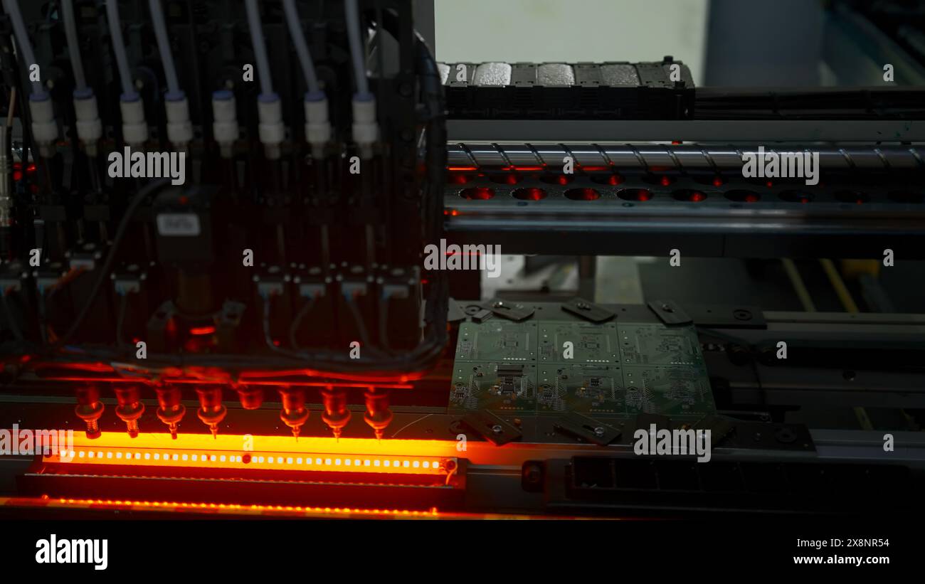 Fully automated assembly line at electronics factory. Creative ...