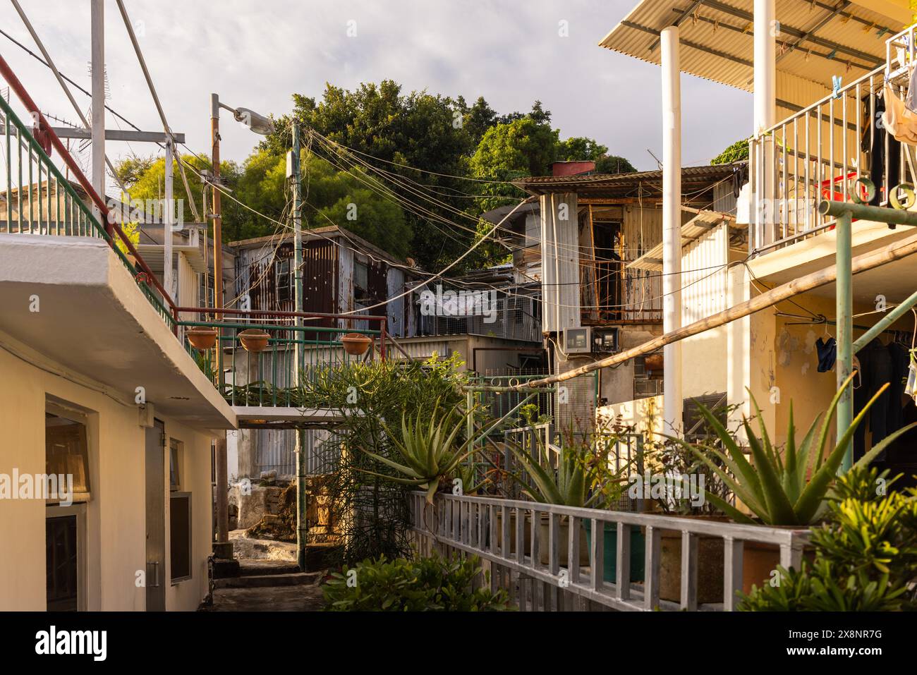 Lie Yue Mun houses on Hong Kong harbour Stock Photo - Alamy