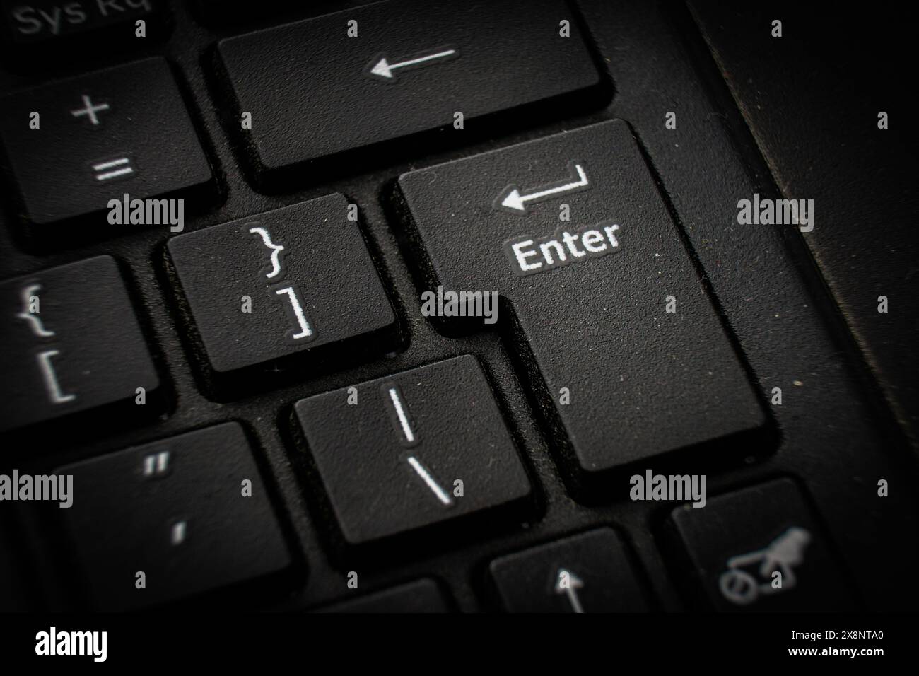 Detailed View of Red Enter Button on Keyboard Stock Photo - Alamy