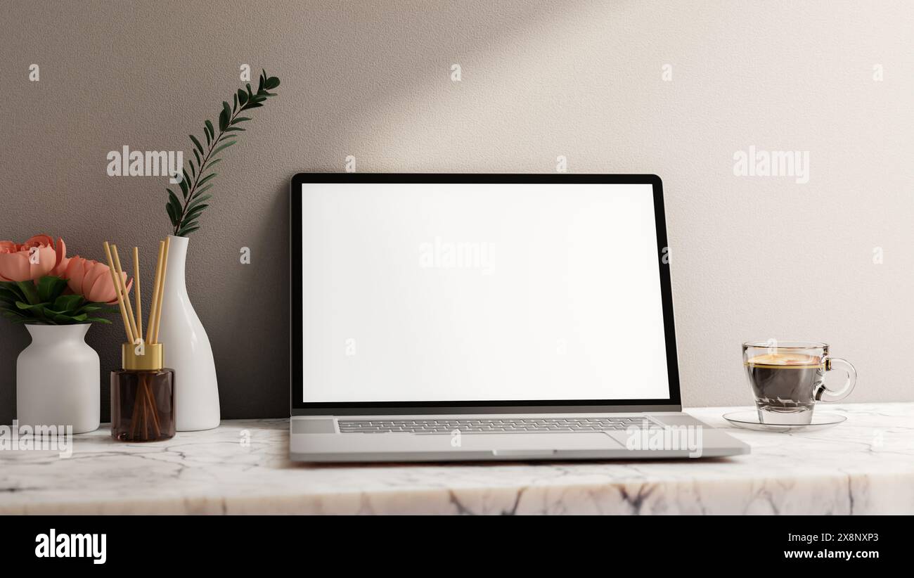 A laptop computer white-screen mockup, a coffee cup, a reed diffuser ...