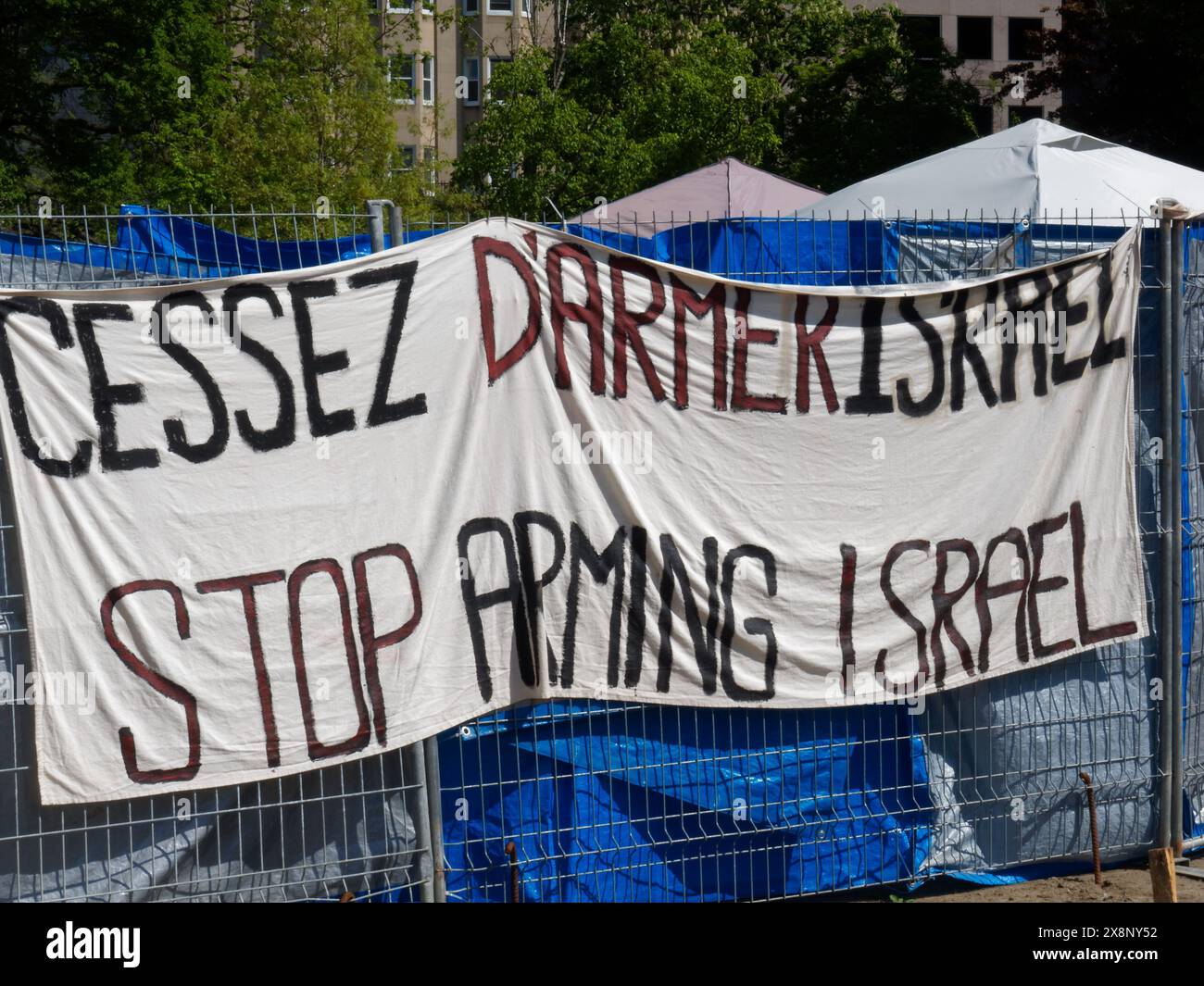 Stop arming Israel banner at the university students pro-Palestinian ...