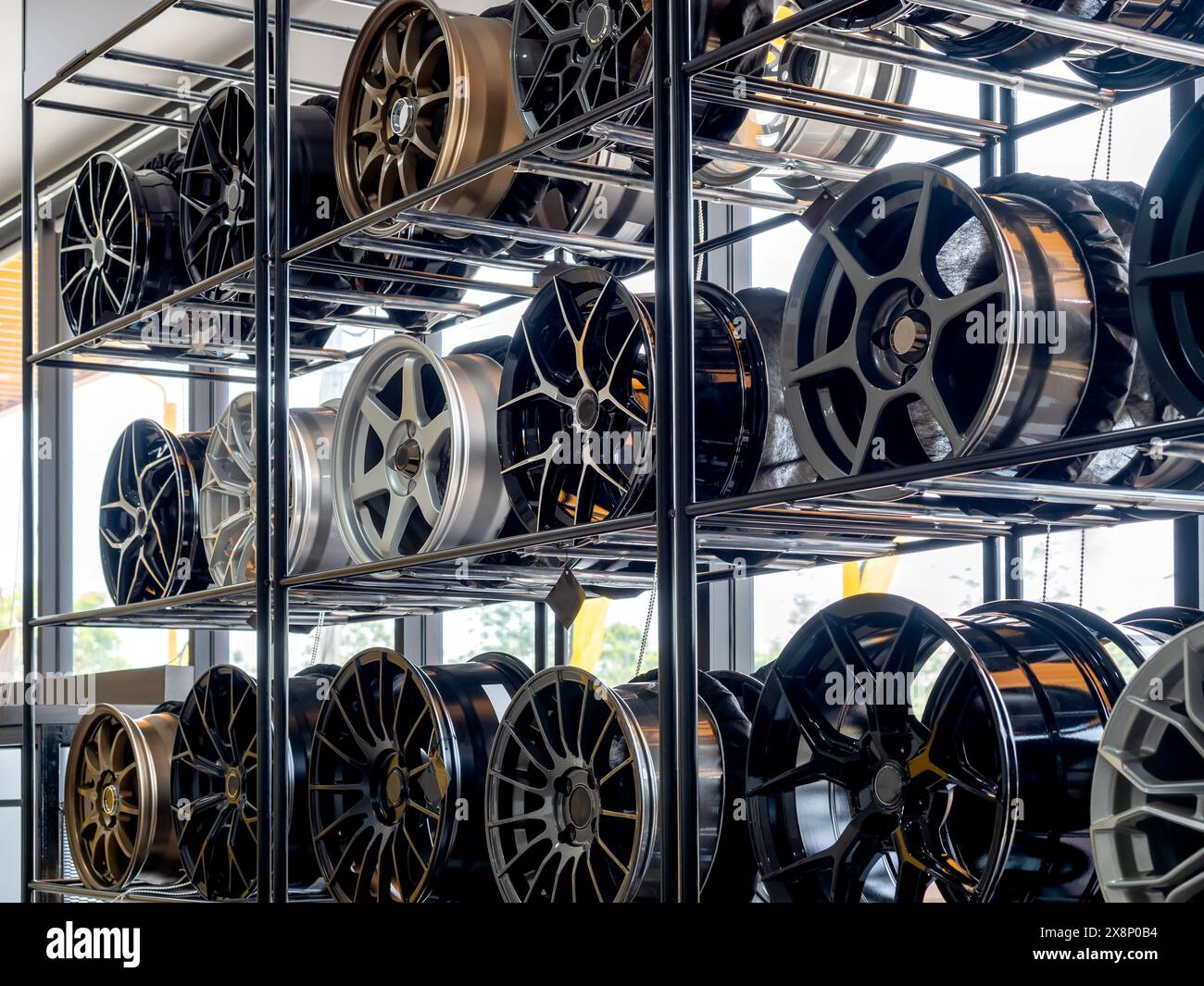 Scene of modern tyre store decoration with various designs of steel ...