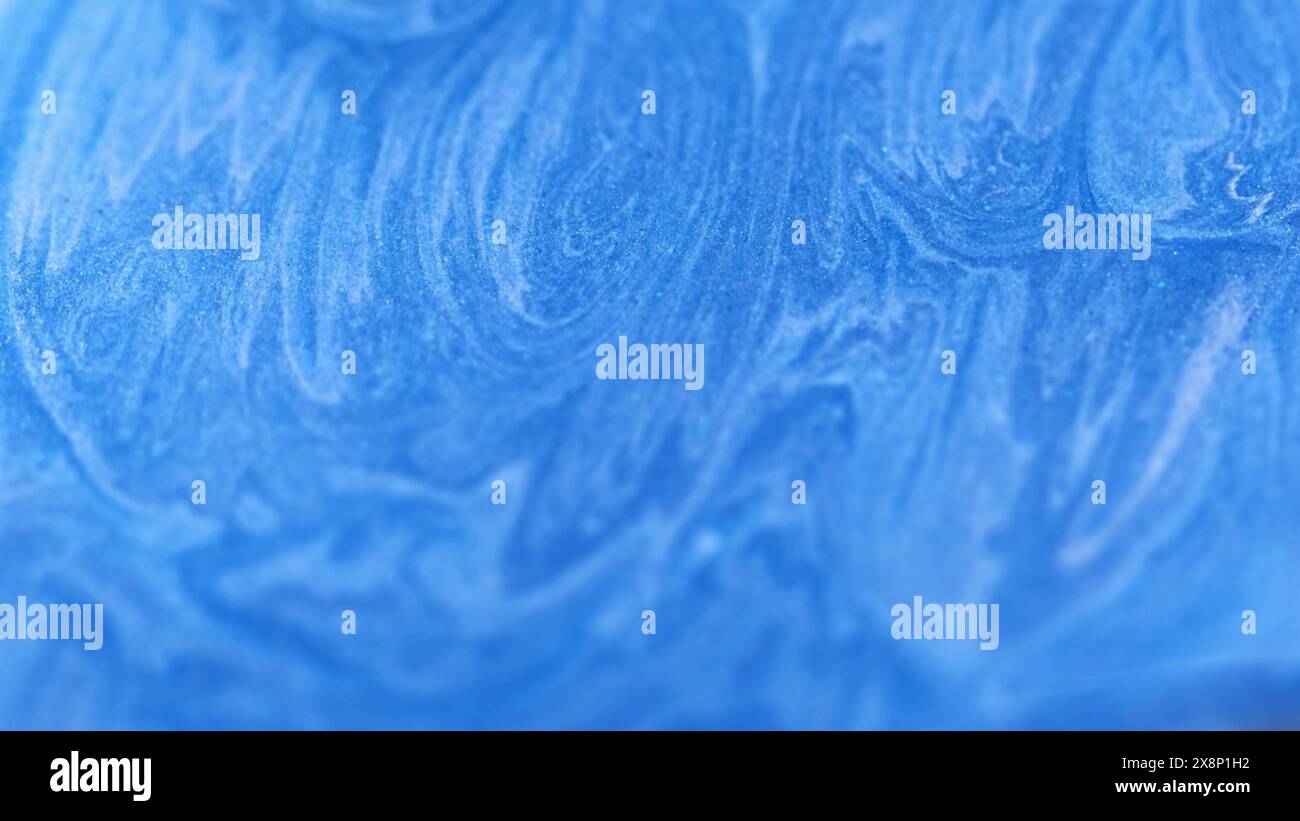 Pouring ink. Glitter swirl. Blue abstract shiny waves white stains ...