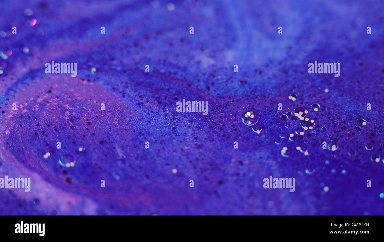 Shimmer oil drops blur paint hi-res stock photography and images - Alamy