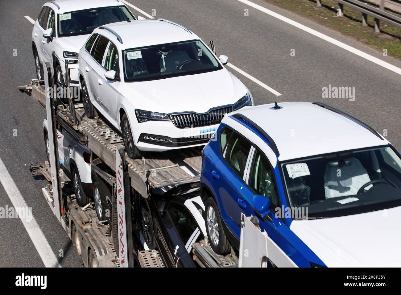 Ruda Slaska, Poland. 27th Mar, 2024. New Skoda cars seen on a truck ...