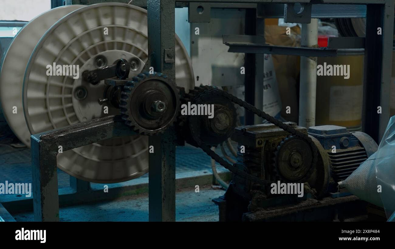 A mechanism with rotating gears. Creative. Industrial background at the ...