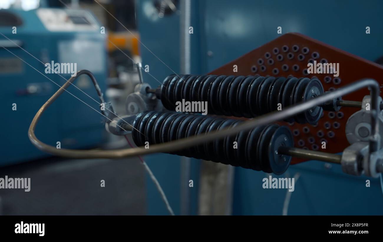 Coil winder machine with copper wire. Creative. Copper round rollers ...