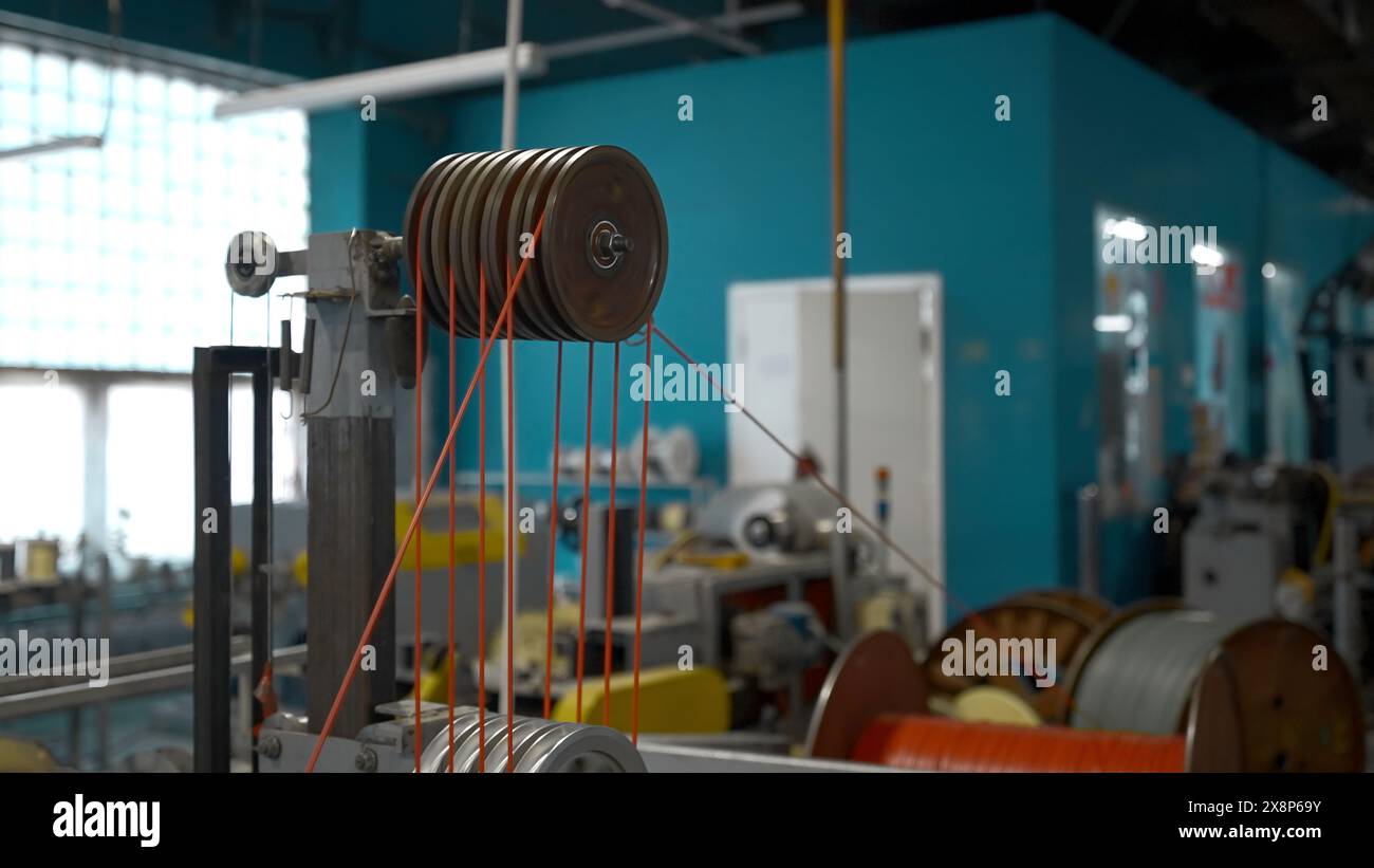 Steel wire coils at a tire factory. Creative. Rotating and reeling ...