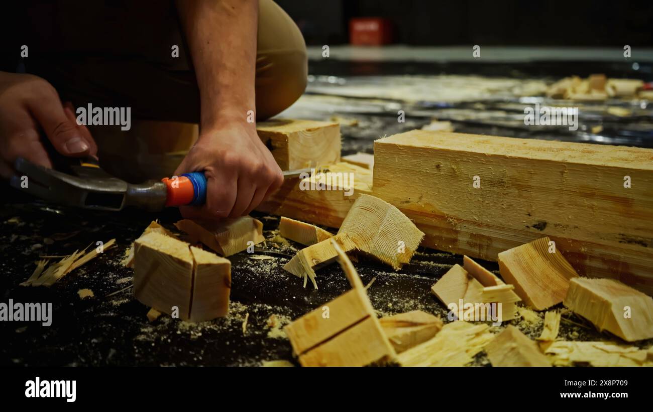 Carpentry works, carving wood block. Media. Using chisel for processing ...