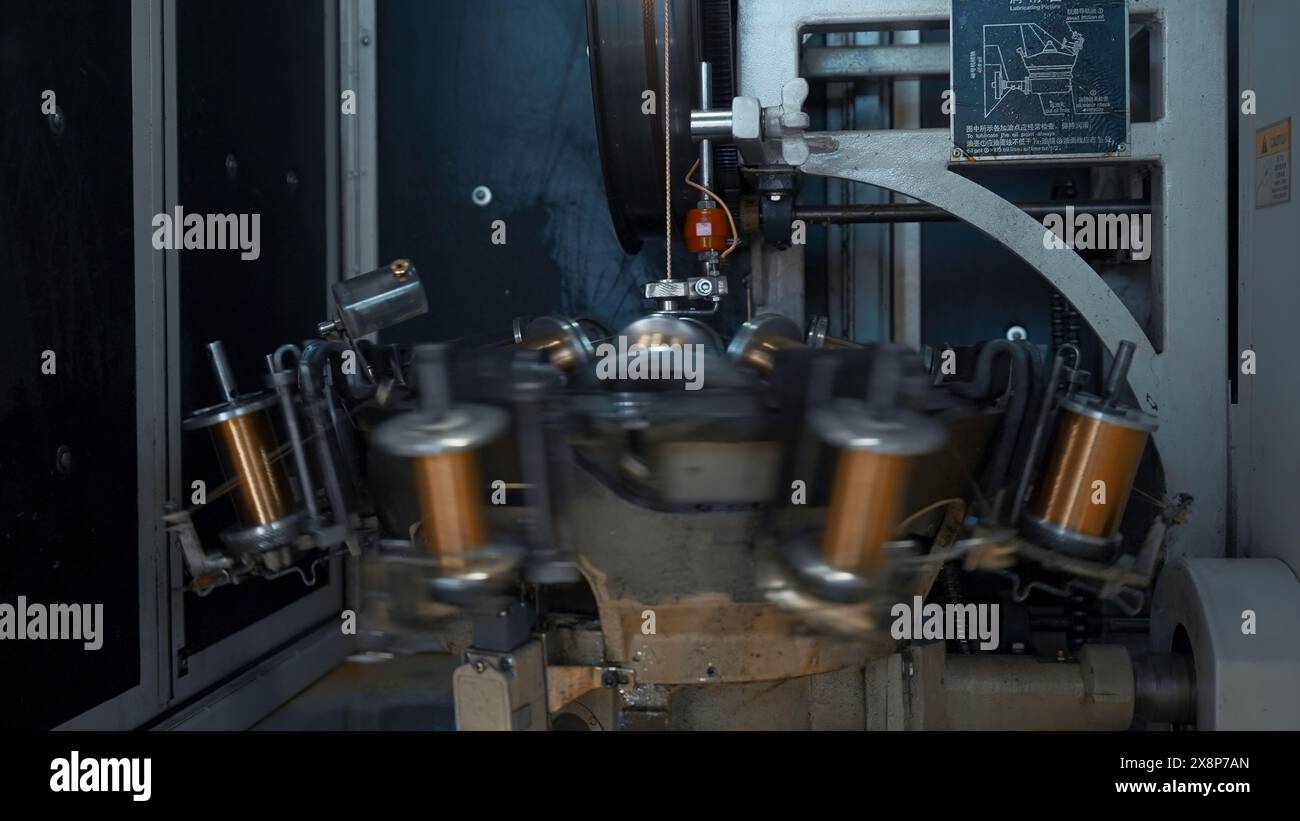 Coils with copper wire rotate on machine. Creative. Rotating coils of ...
