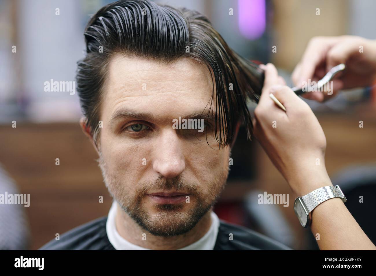 Man getting long hair cut hi-res stock photography and images - Alamy
