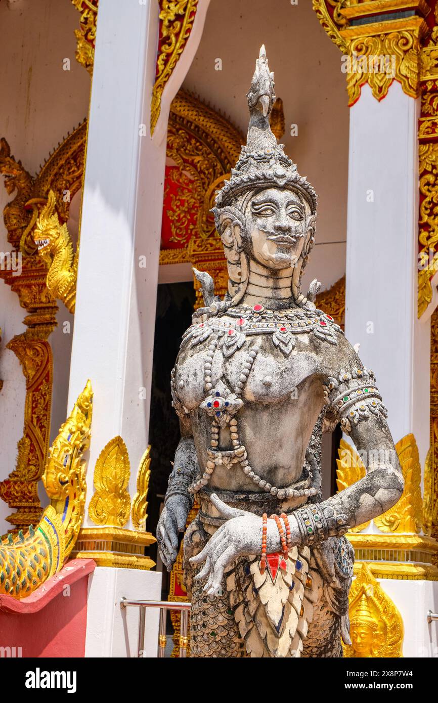 Statue of mustachioed figure outside Wat Chang Kham, Wiang Kum Kam ...